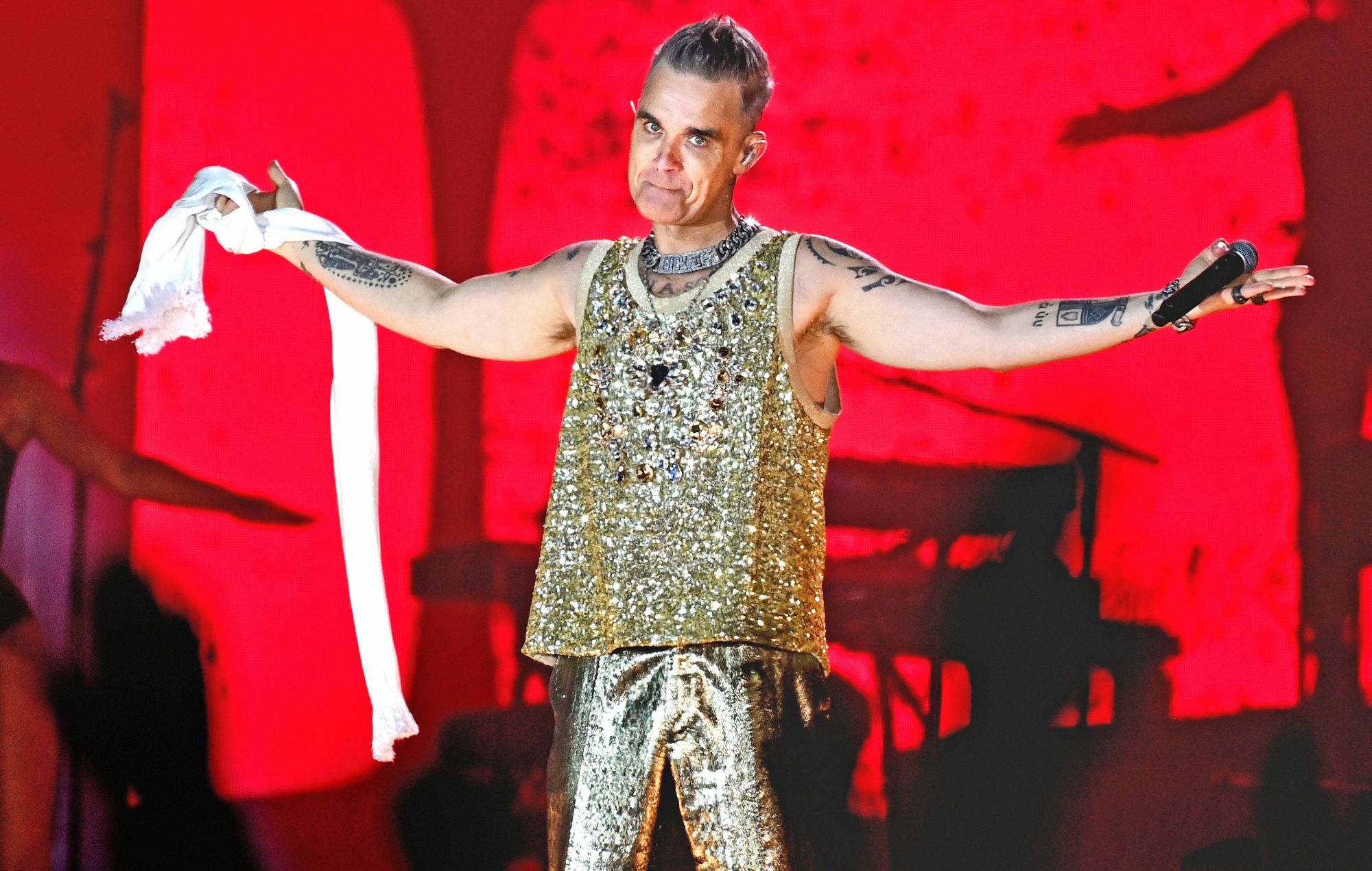 Robbie Williams unmasks deep struggles in raw first look at Netflix ...