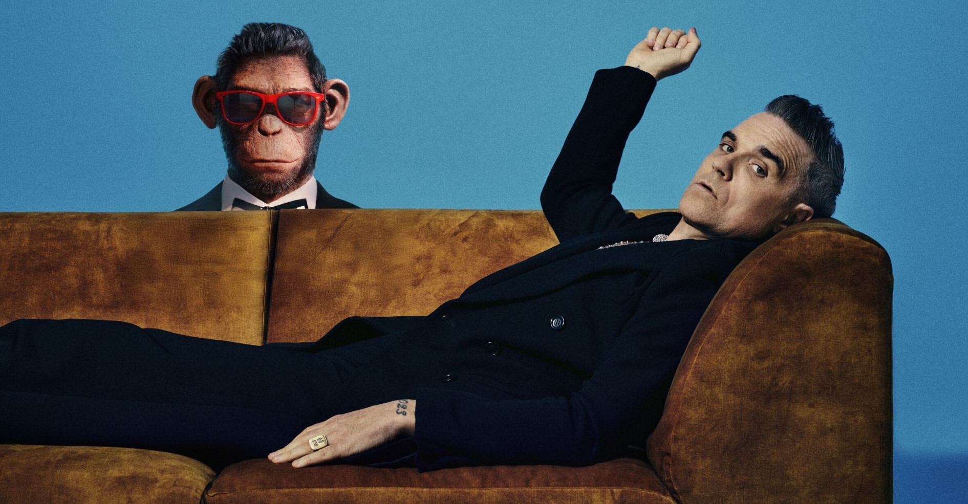 Robbie Williams Explains the CGI Monkey in His Biopic "Better Man ...