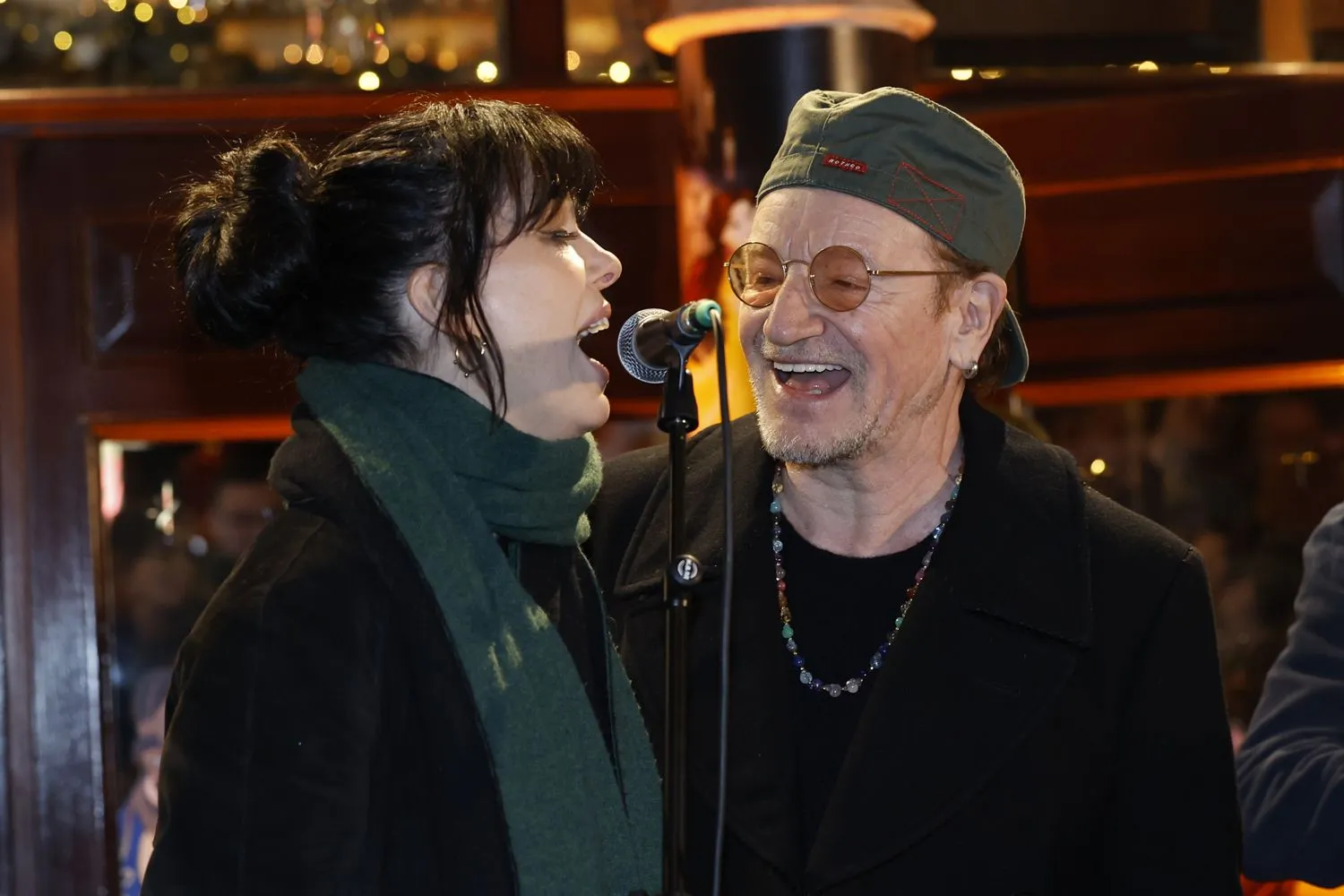 Bono Joins Imelda May for Surprise Christmas Eve Busking Duet | TopHit ...
